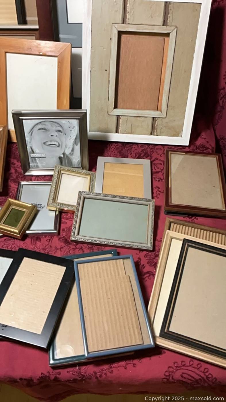 Assorted wood, metal, plastic photo frames | Maxsold