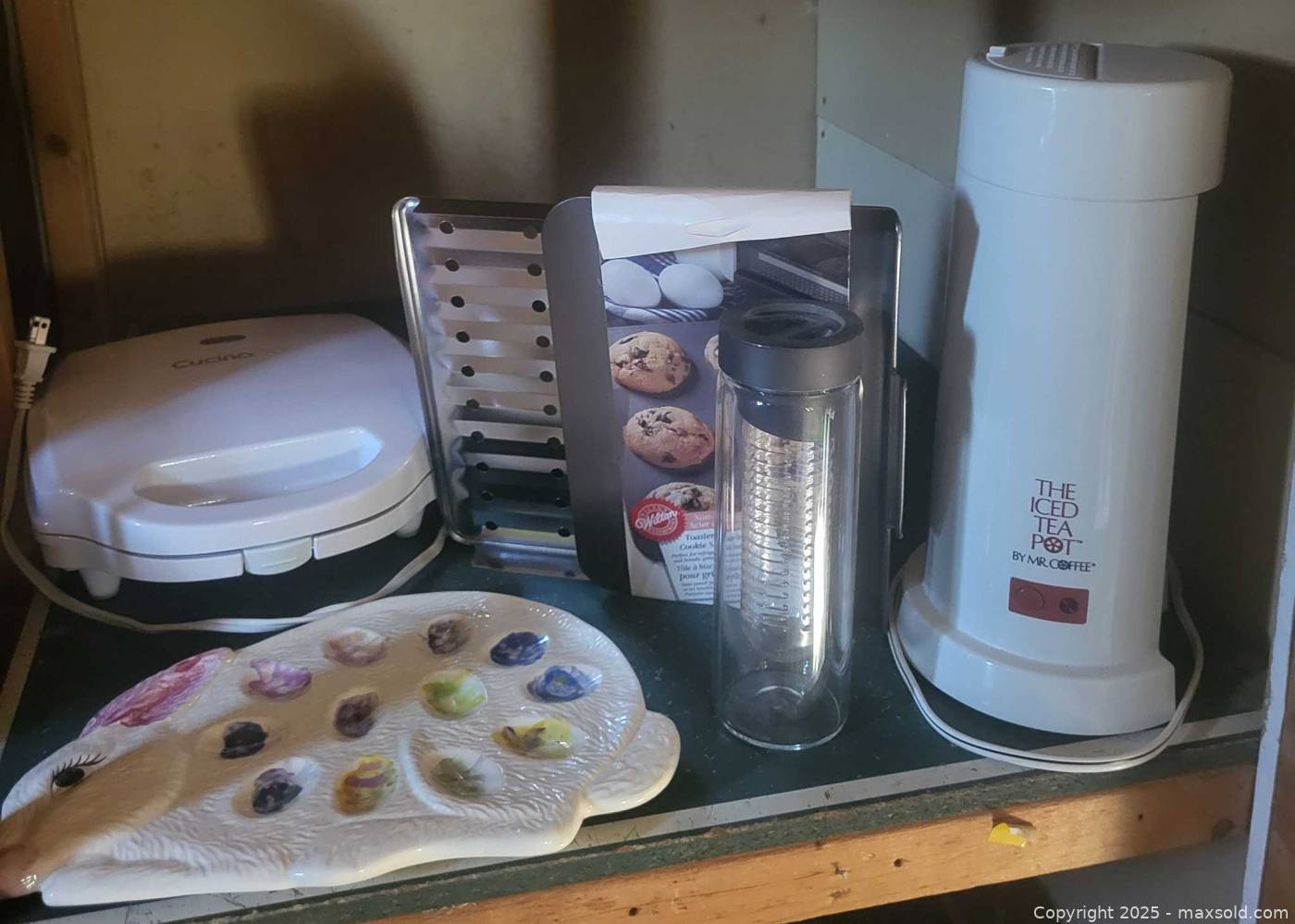 Electric mini pie maker, Mr. Coffee iced tea pot, deviled egg tray ...