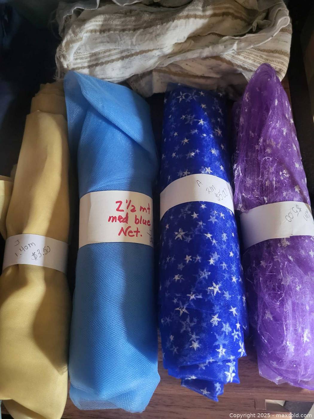 Assorted fabric yardage rolls, approx 12 | Maxsold