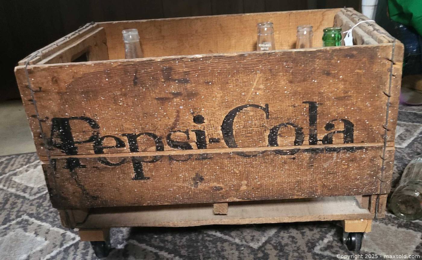 Pepsi-Cola wooden crate on casters with 6 glass soda bottles | Maxsold