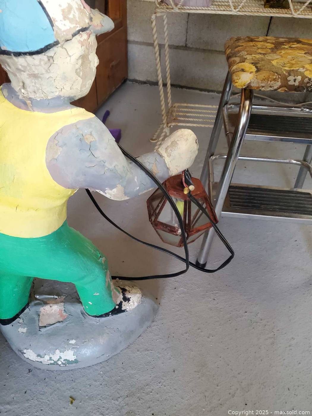 Vintage cast concrete lawn jockey statue with electric lantern | Maxsold