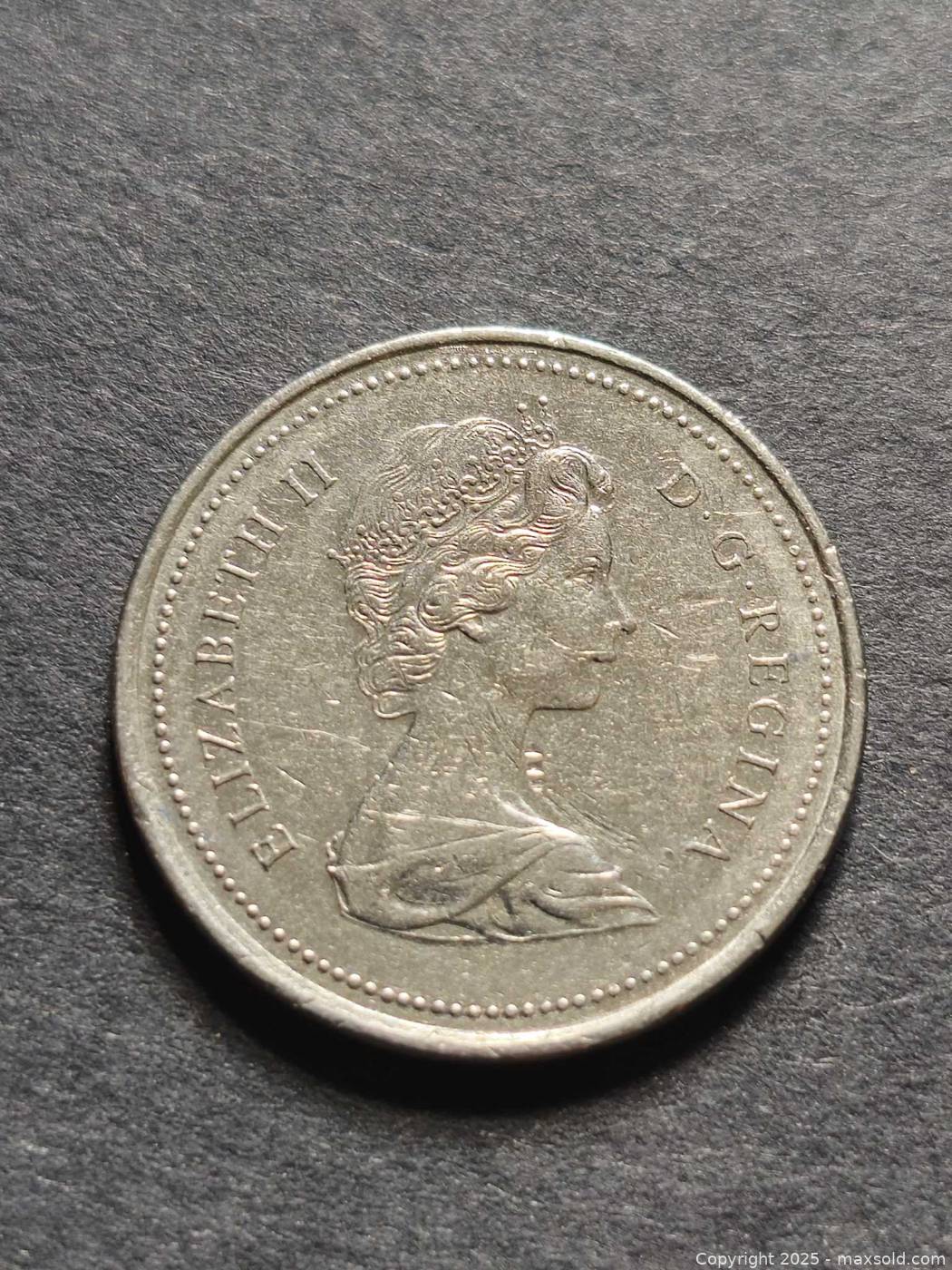 1973 Canadian Mounted Quarter | Maxsold