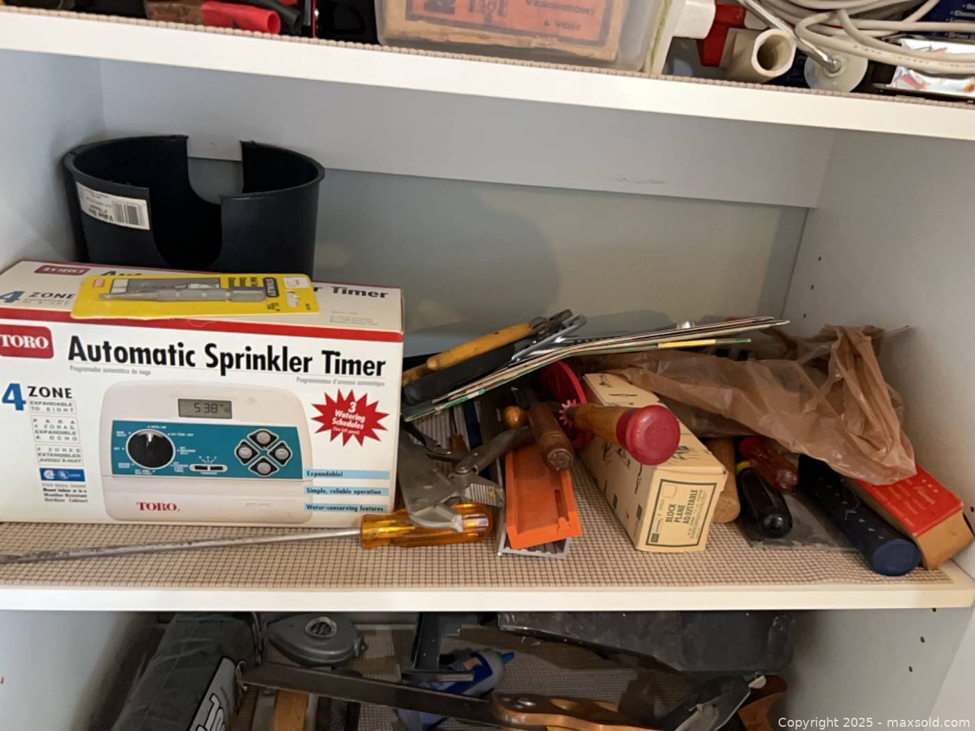 Assorted hand tools, fasteners, Toro timer | Maxsold