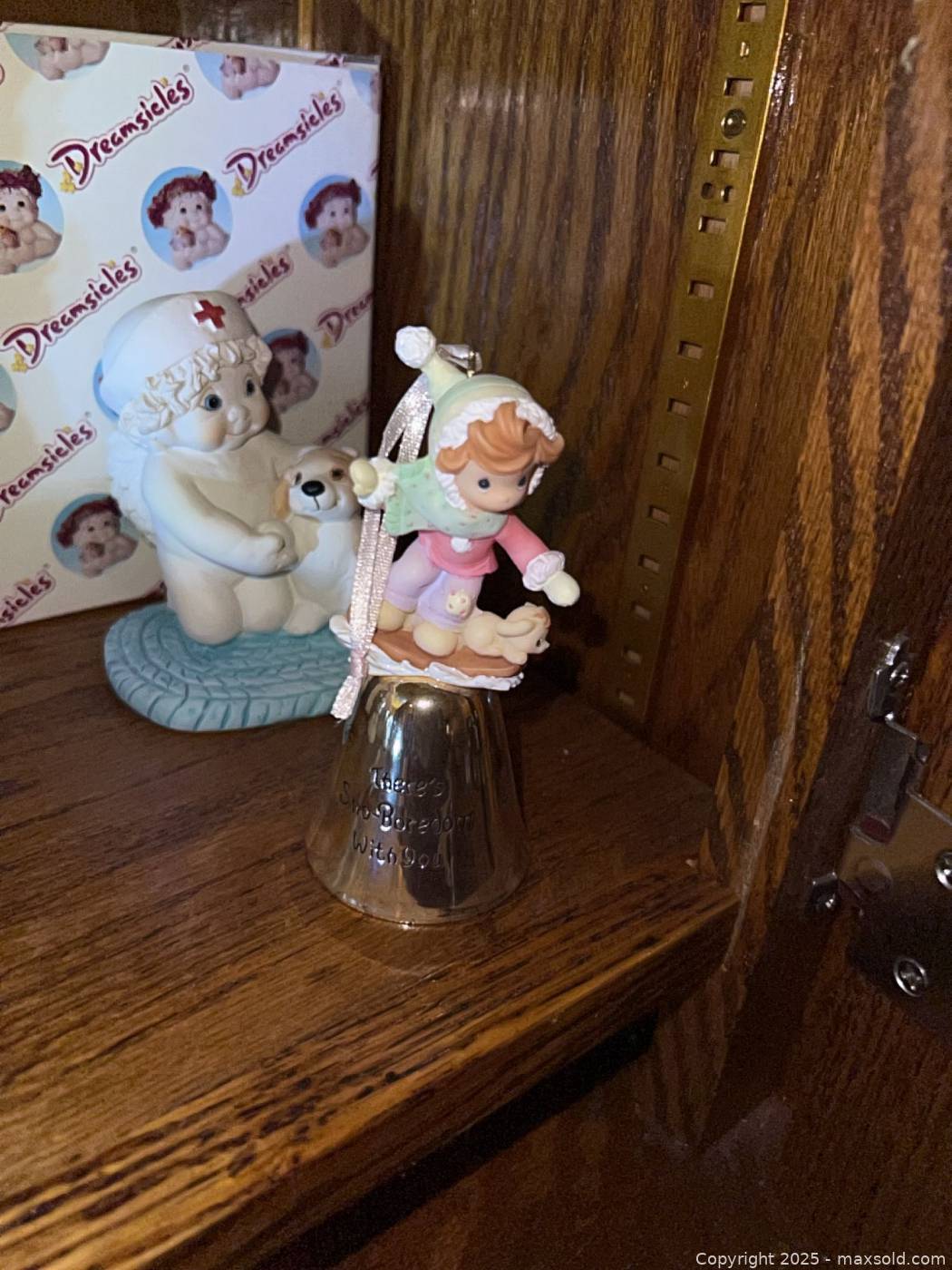Precious Moments & Dreamsicles figurines with nurse-themed bell | Maxsold