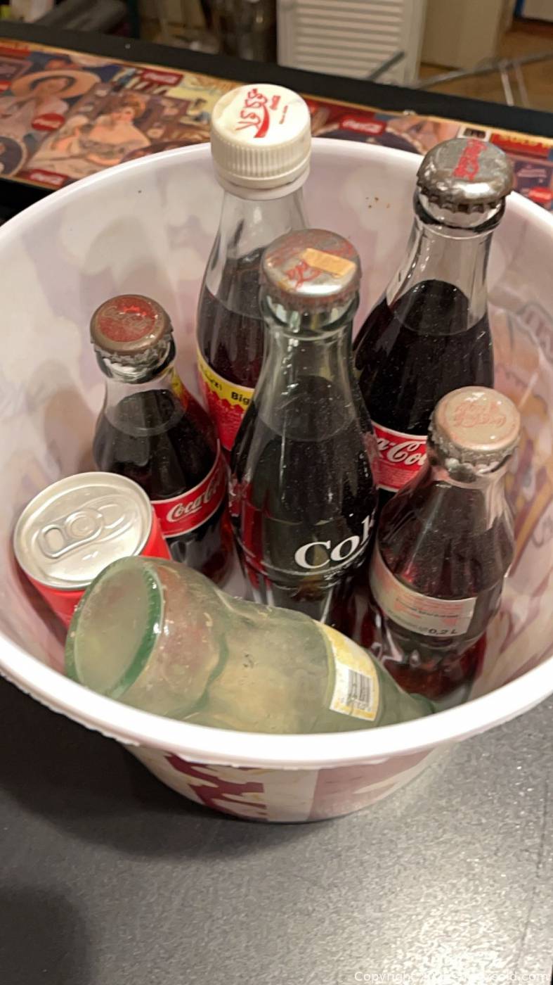 Coca-Cola figurines, bottles, wall hanging | Maxsold