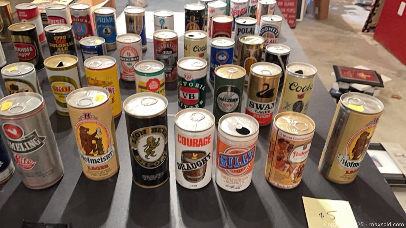 51 vintage beverage cans assorted plus magazine | Maxsold