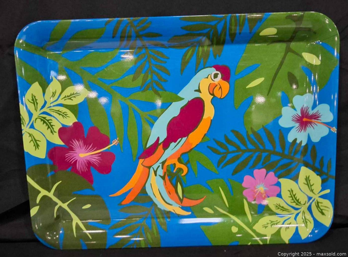 Three decorative metal serving trays | Maxsold