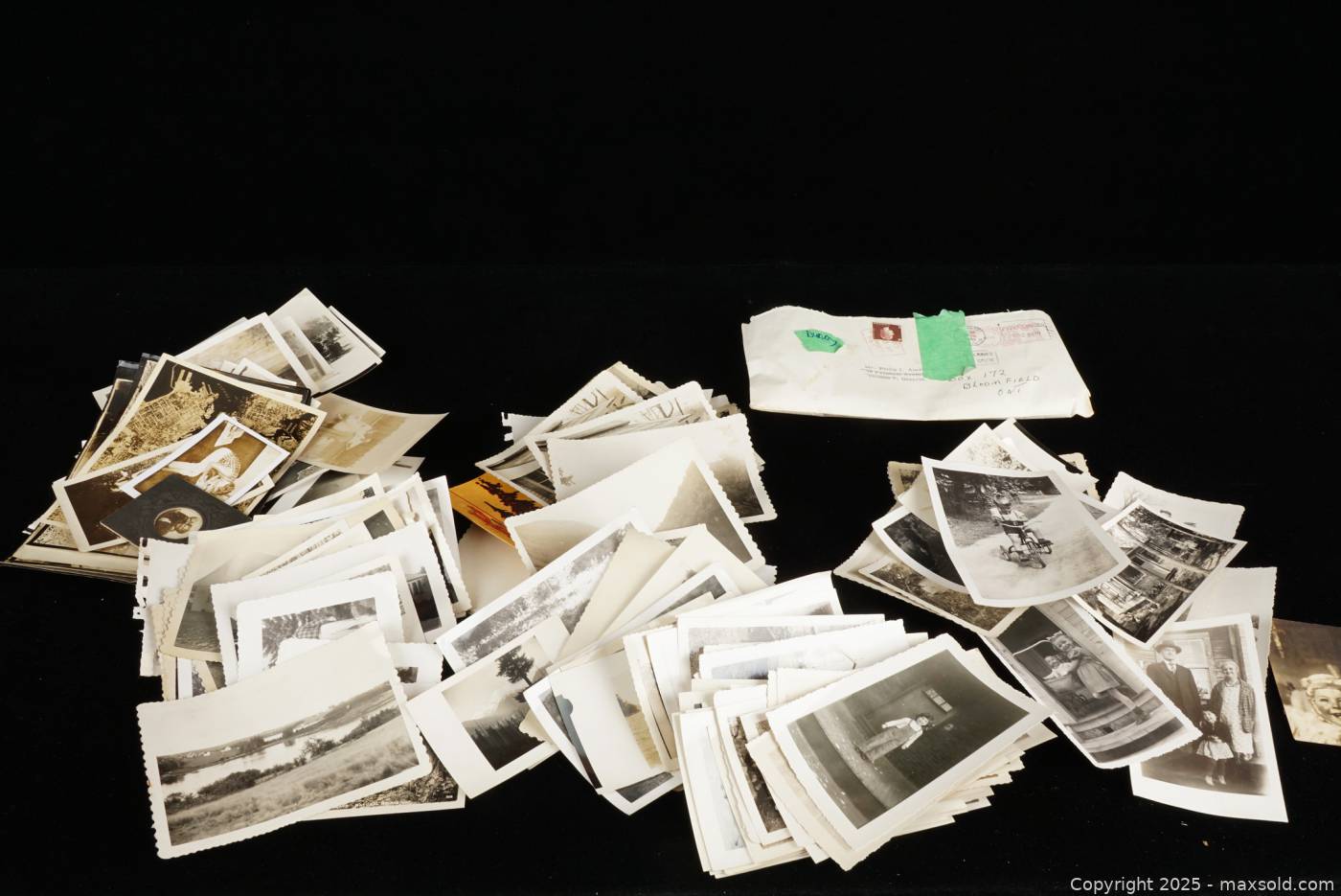 Vintage black-and-white snapshot photographs | Maxsold