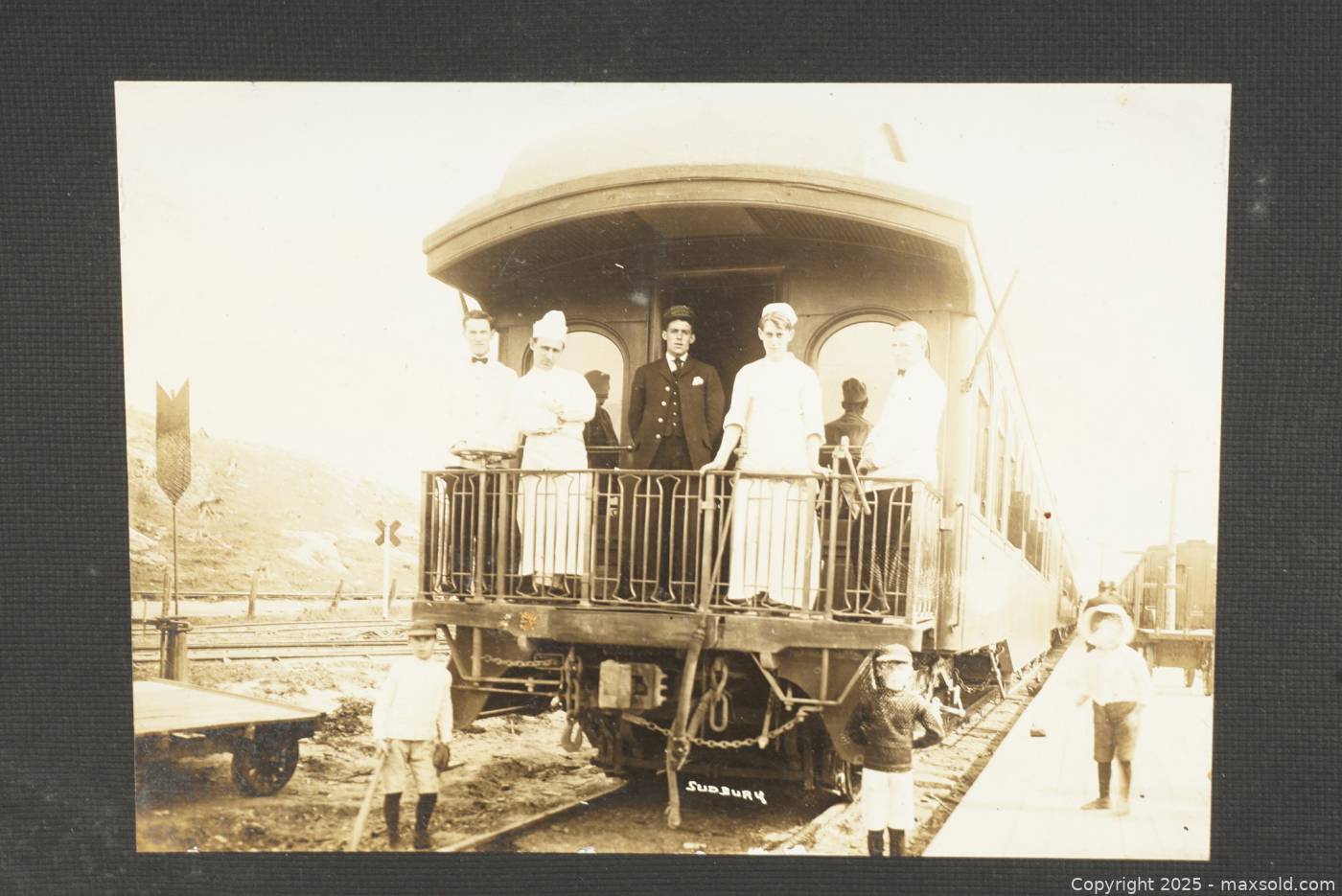 Antique railroad crew with boys photograph | Maxsold