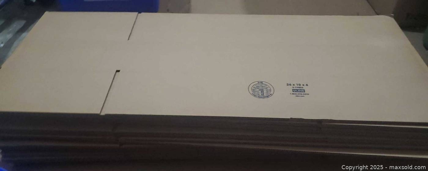 25 Uline S-19826 corrugated shipping boxes 26×10×4 in | Maxsold