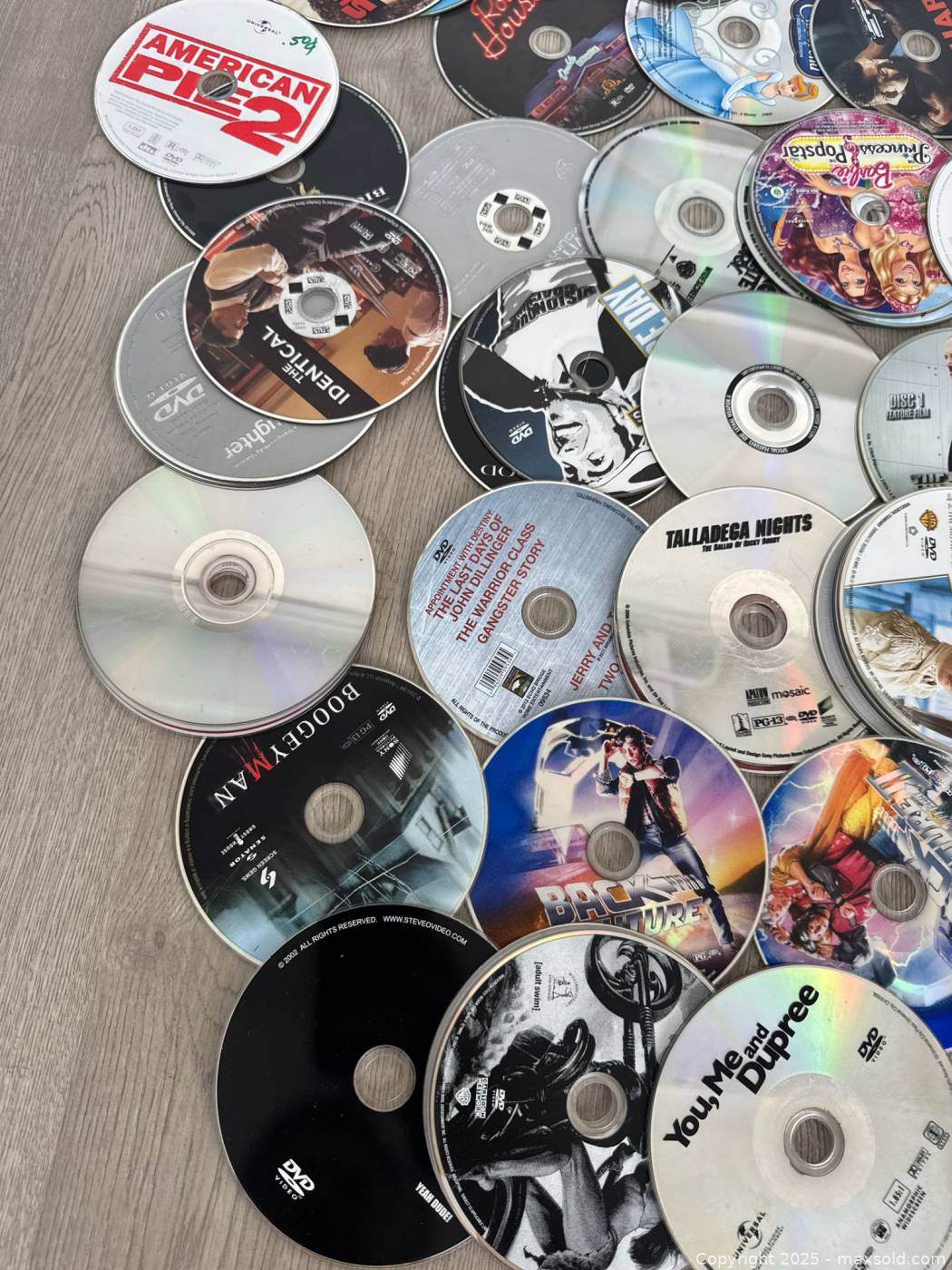 Approximately 100 DVD movie discs | Maxsold