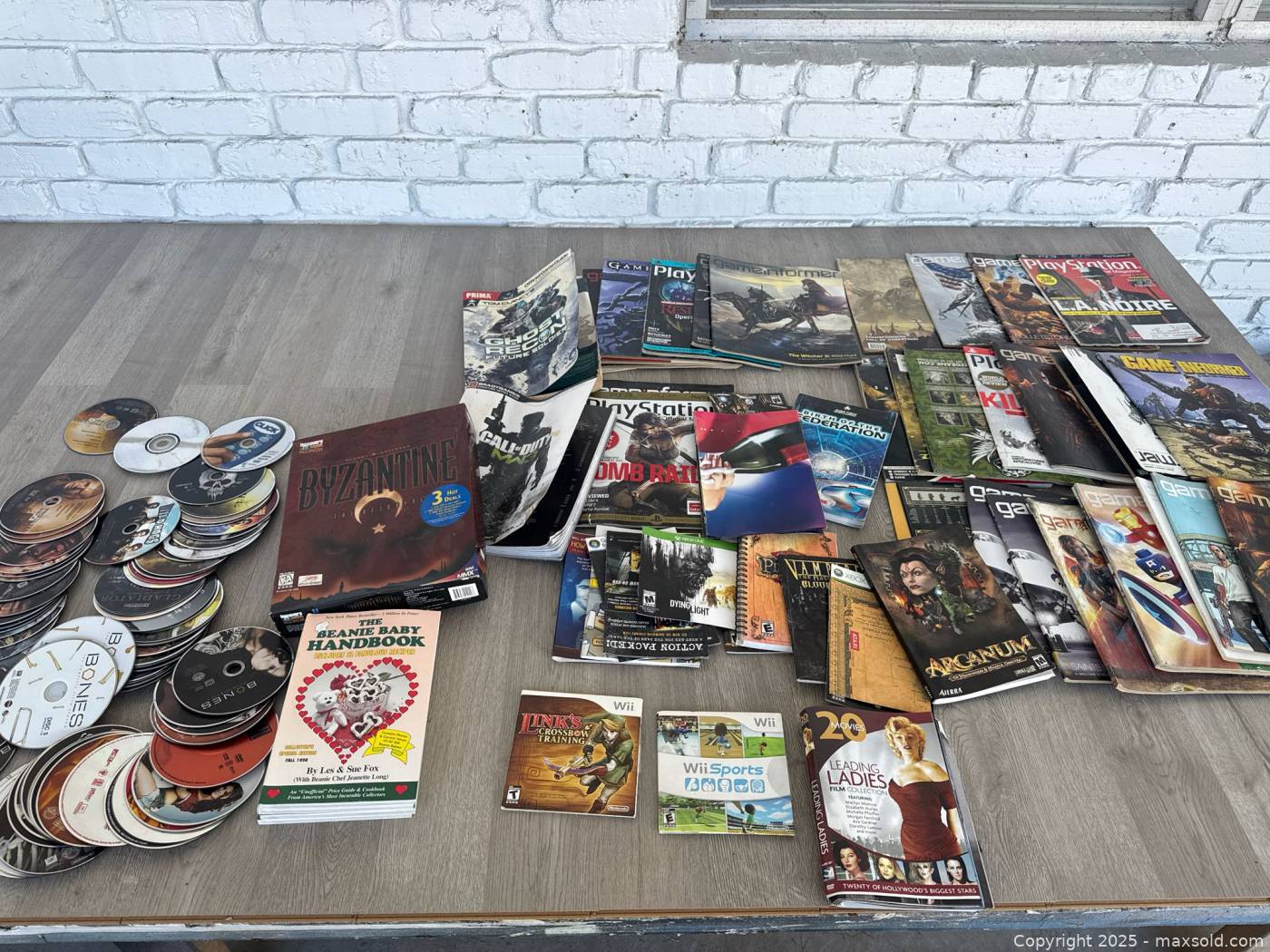Video game magazines, Wii games, loose DVDs | Maxsold