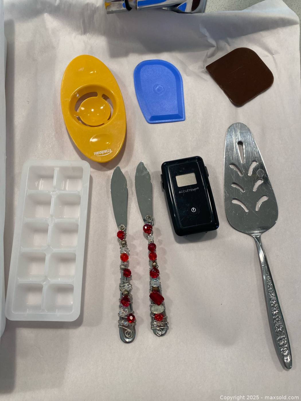 Assorted kitchen utensils and flatware | Maxsold