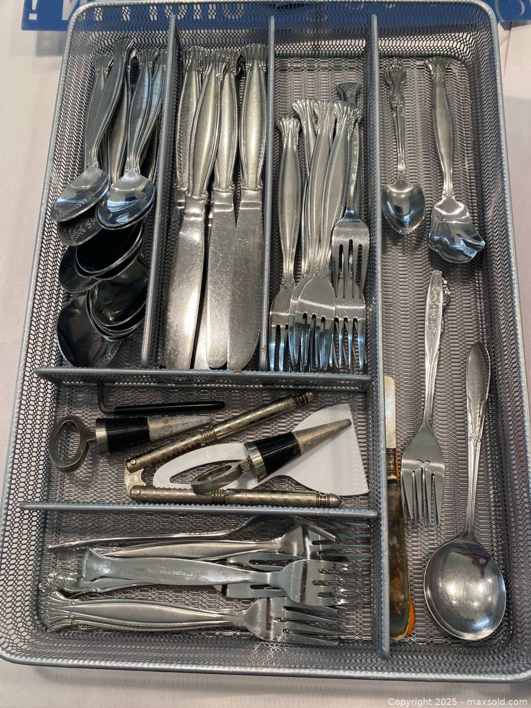 Assorted kitchen utensils and flatware | Maxsold