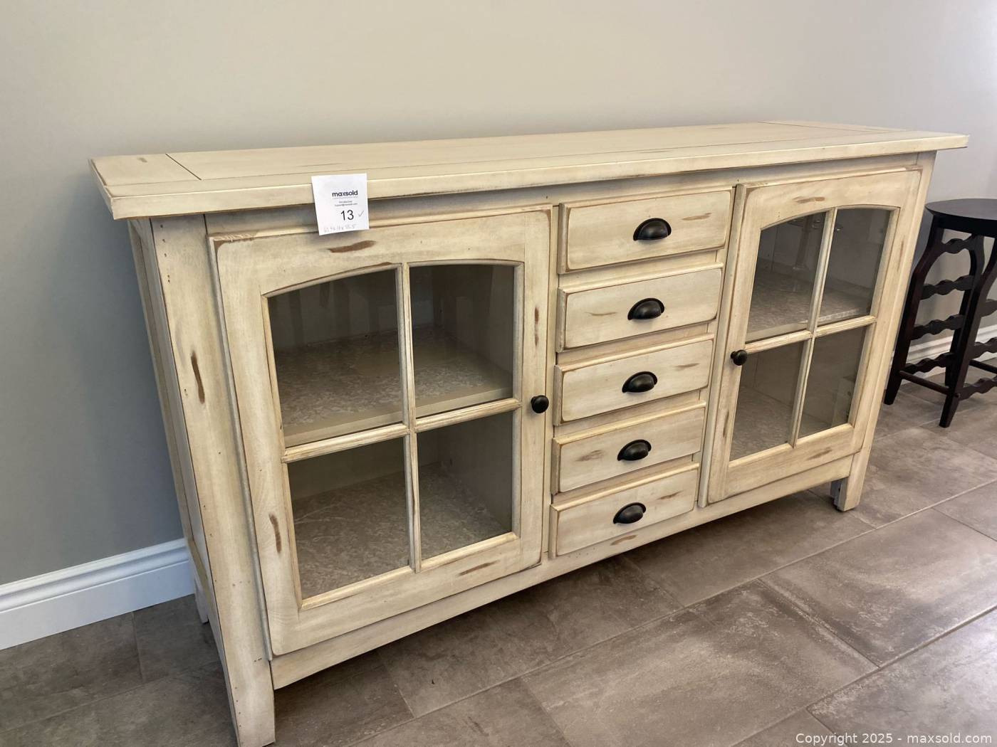 Distressed antique white buffet with glass doors | Maxsold