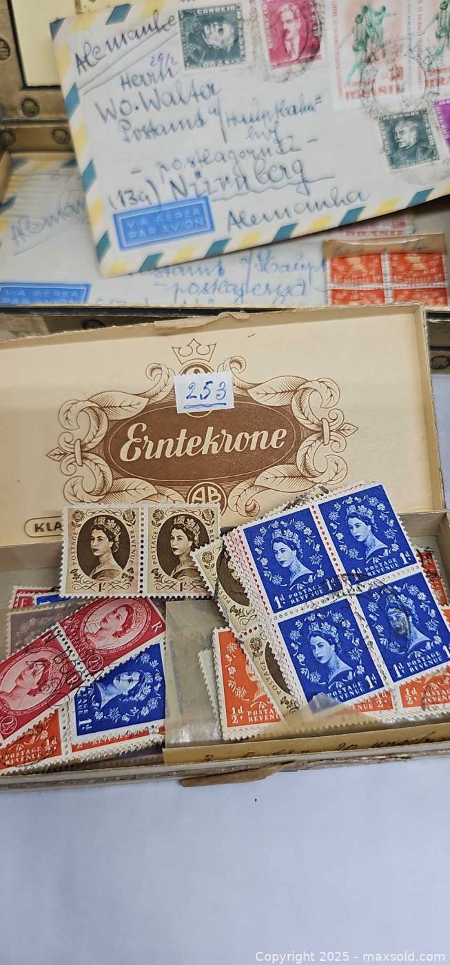 Two boxes assorted European postage stamps | Maxsold