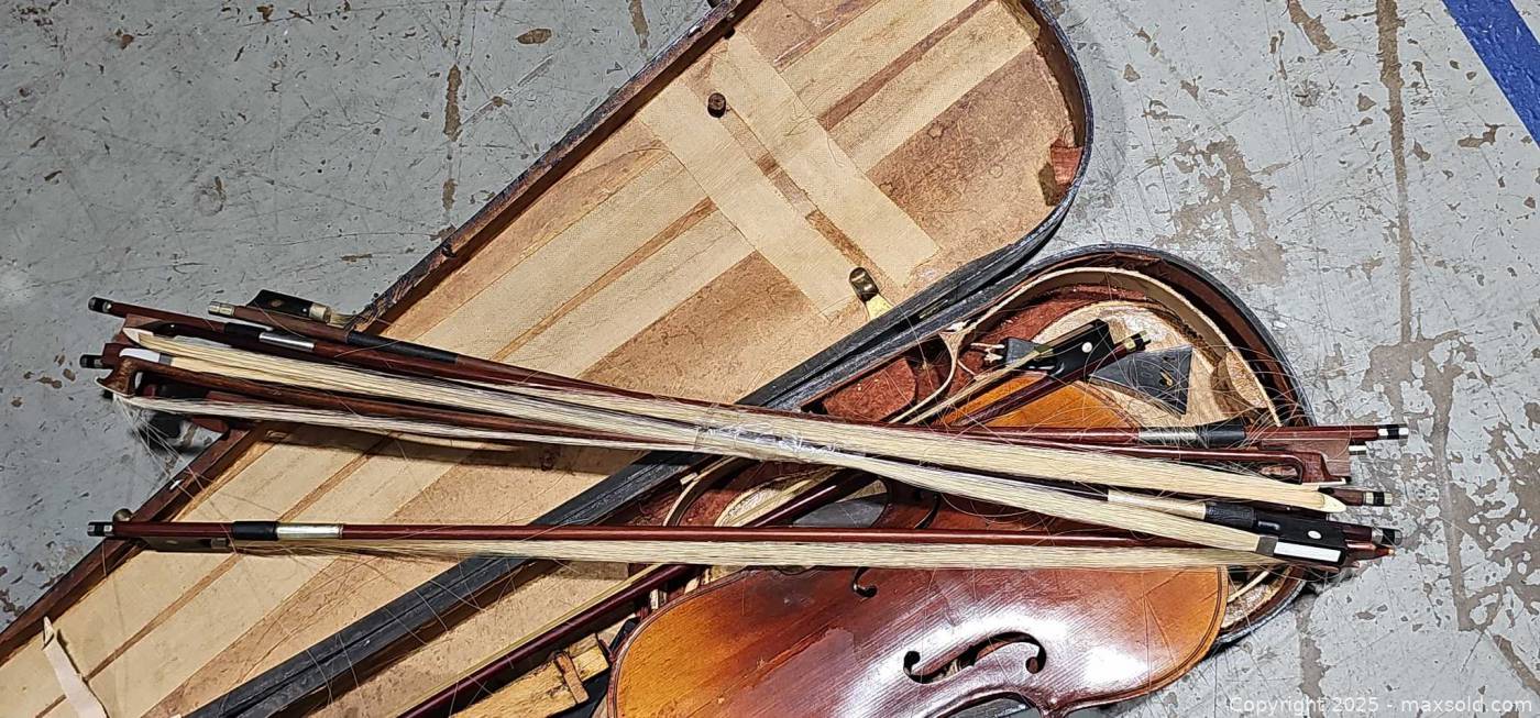 Violin body with interior label and bows | Maxsold