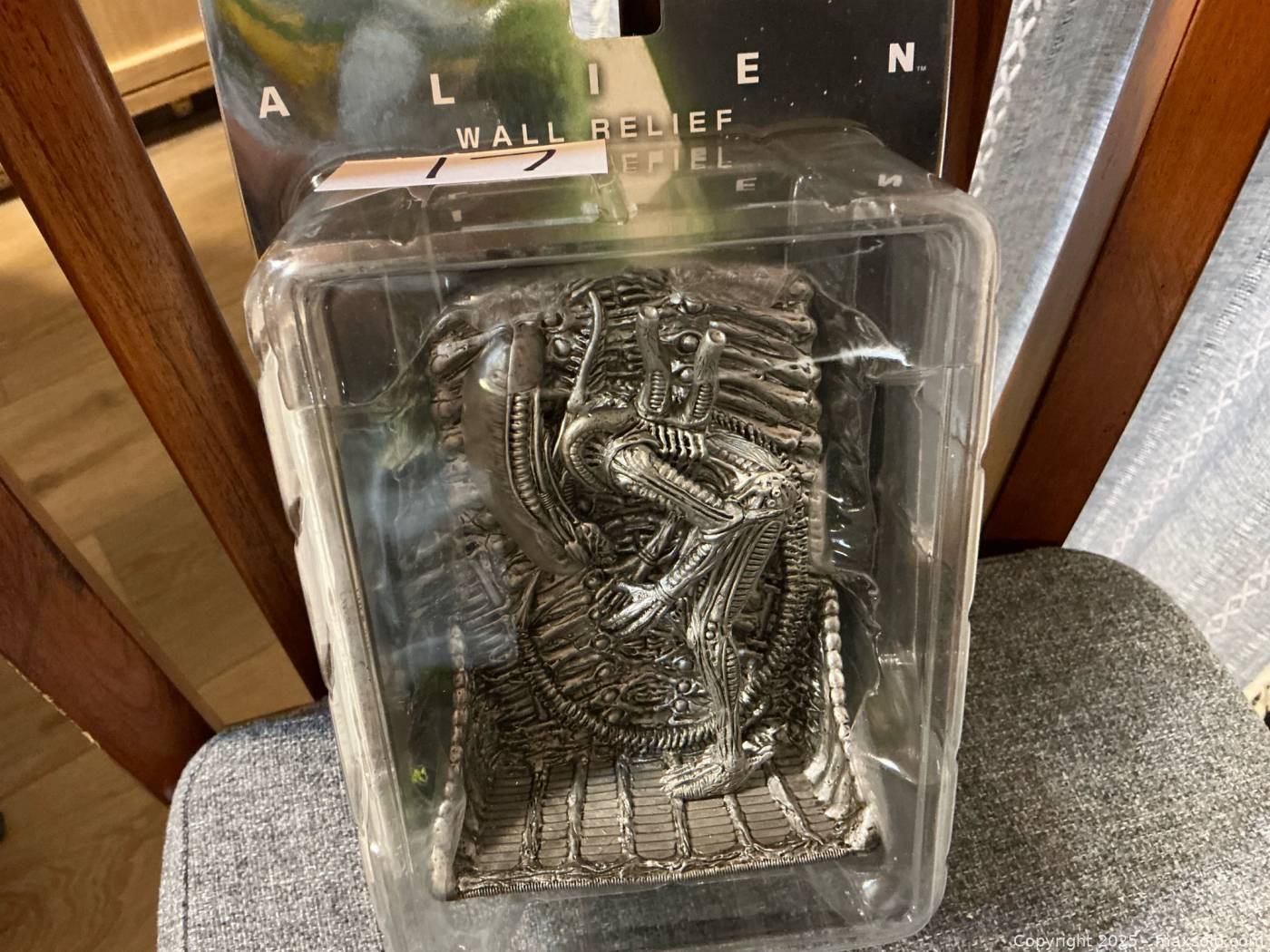 Alien Xenomorph wall relief sculpture in sealed packaging | Maxsold