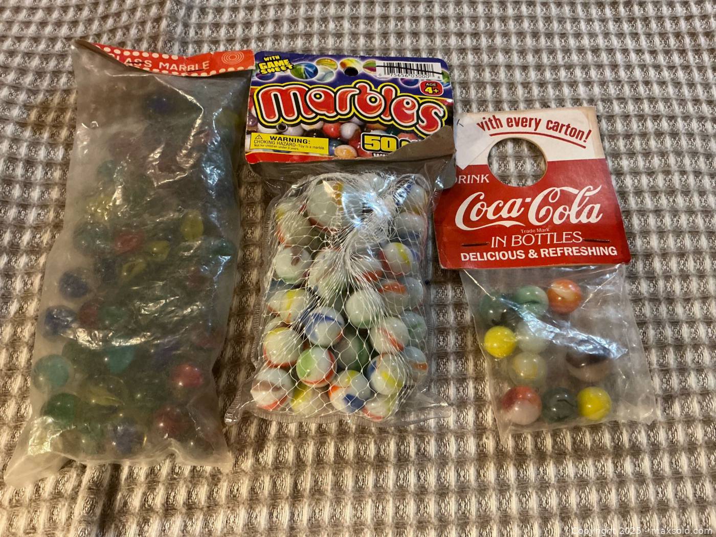 Three Packs of Glass Marbles | Maxsold