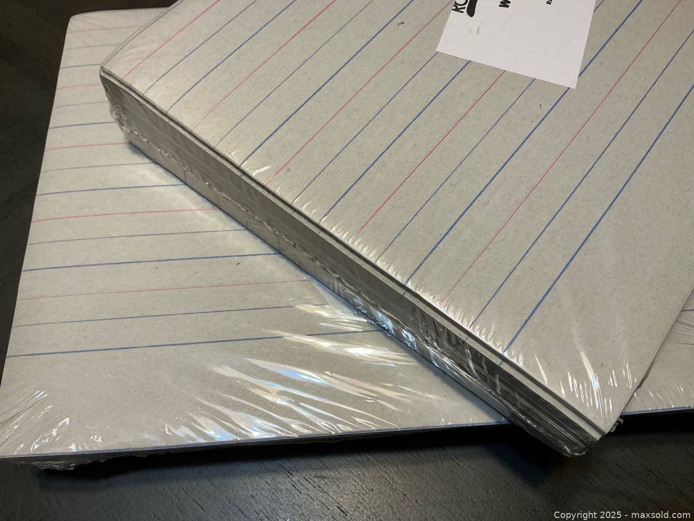 Two sealed packs white lined newsprint paper | Maxsold