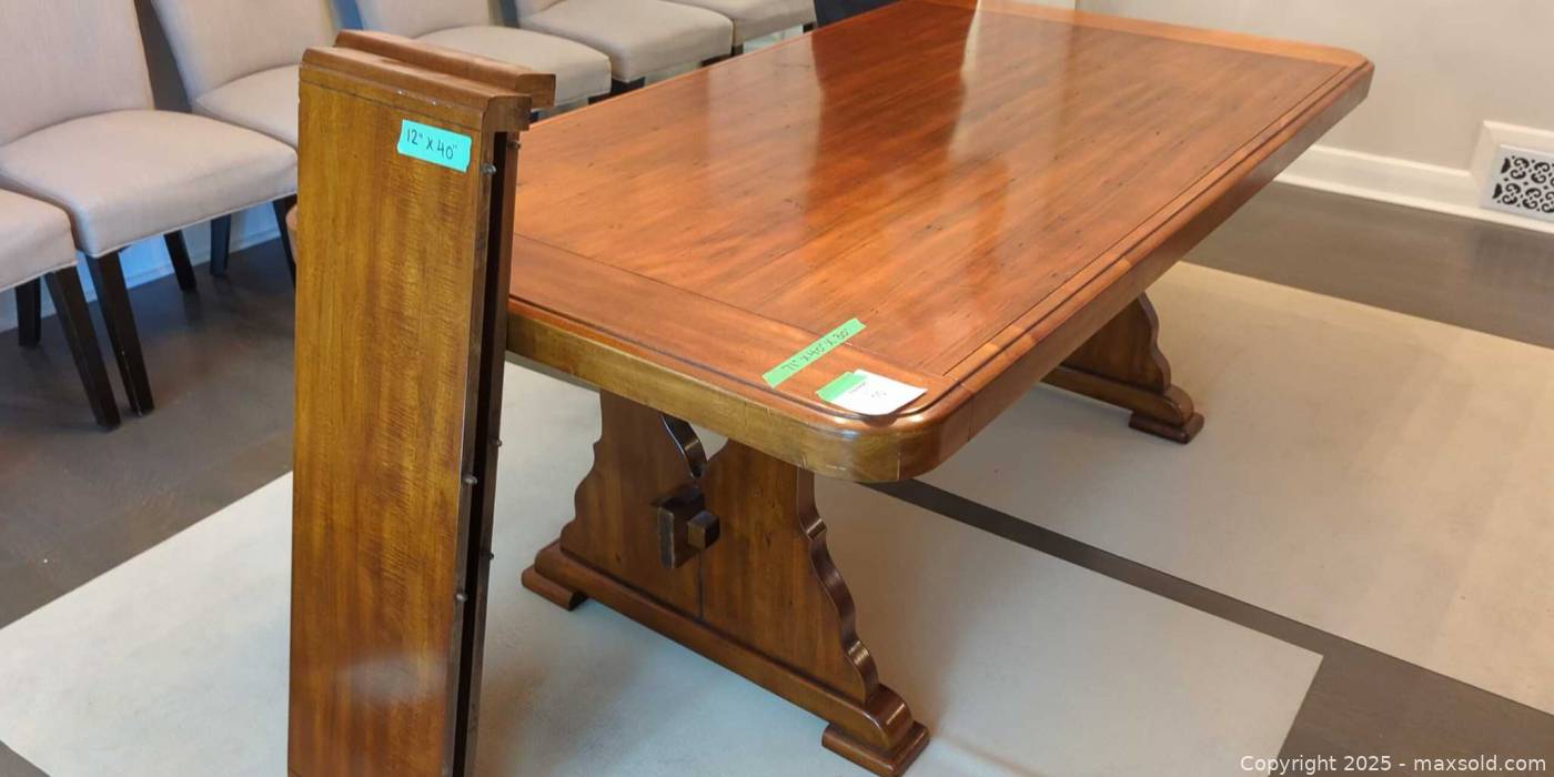 Solid wood trestle extension dining table | Maxsold