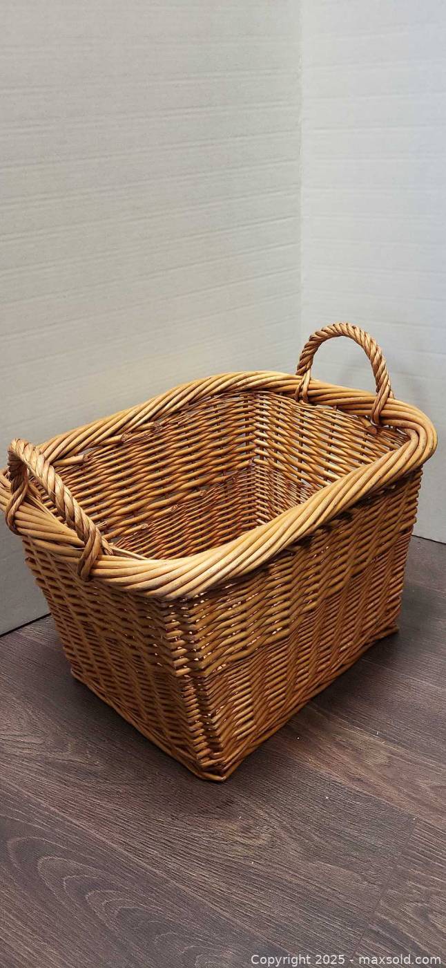 Four large wicker baskets | Maxsold