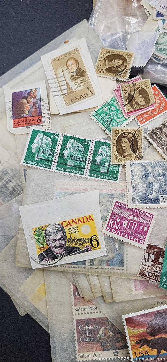 Assorted loose postage stamps collection | Maxsold