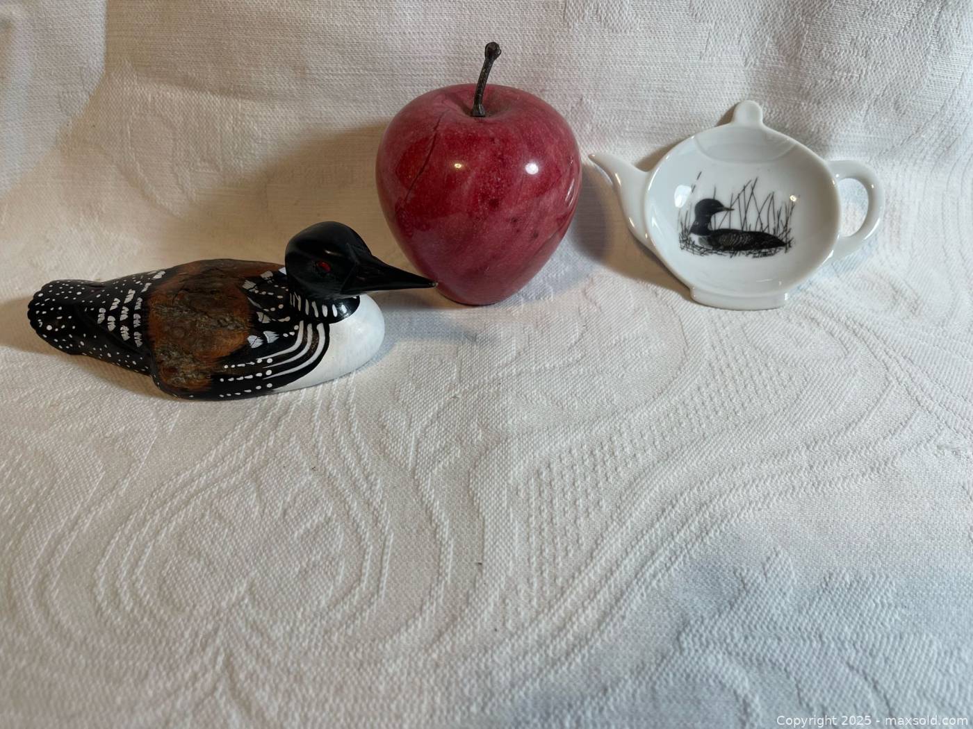 Marble apple paperweight, wooden loon carving, ceramic loon motif ...