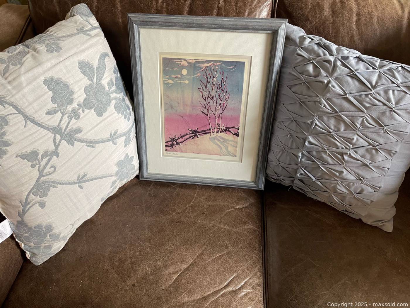 Signed Sarah Hale framed batik art with two decorative pillows | Maxsold