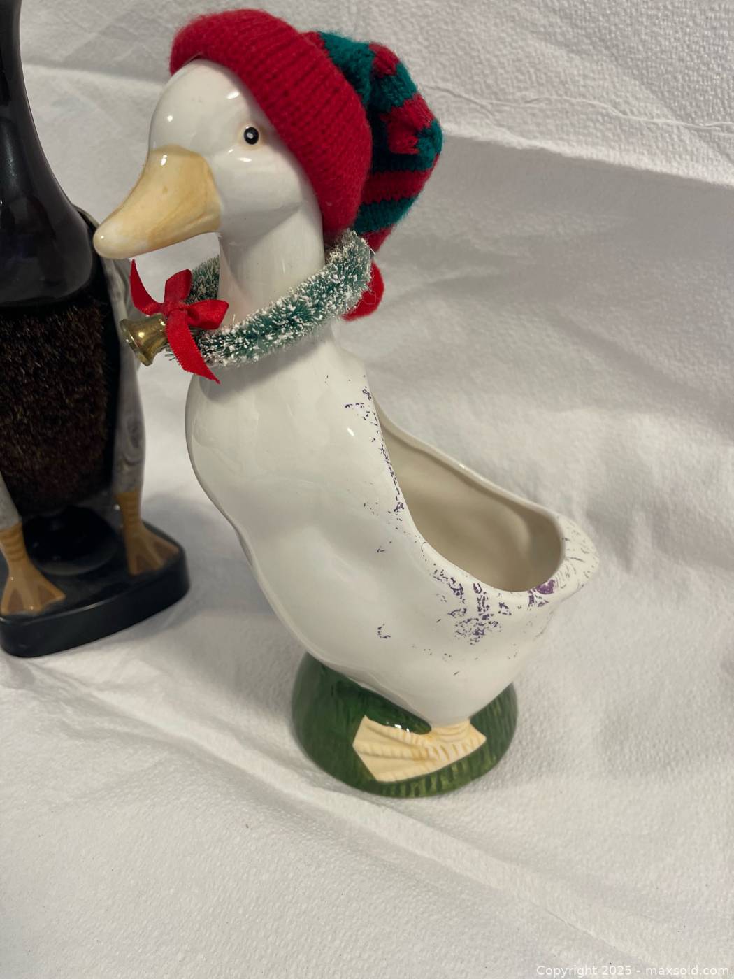 Bakelite Goose Clothes Brush and Ceramic Goose Planter | Maxsold