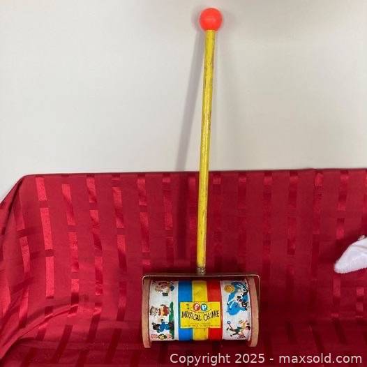 Vintage Fisher-Price Musical Chime push toy | Maxsold