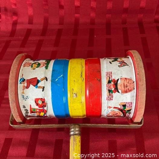 Vintage Fisher-Price Musical Chime push toy | Maxsold
