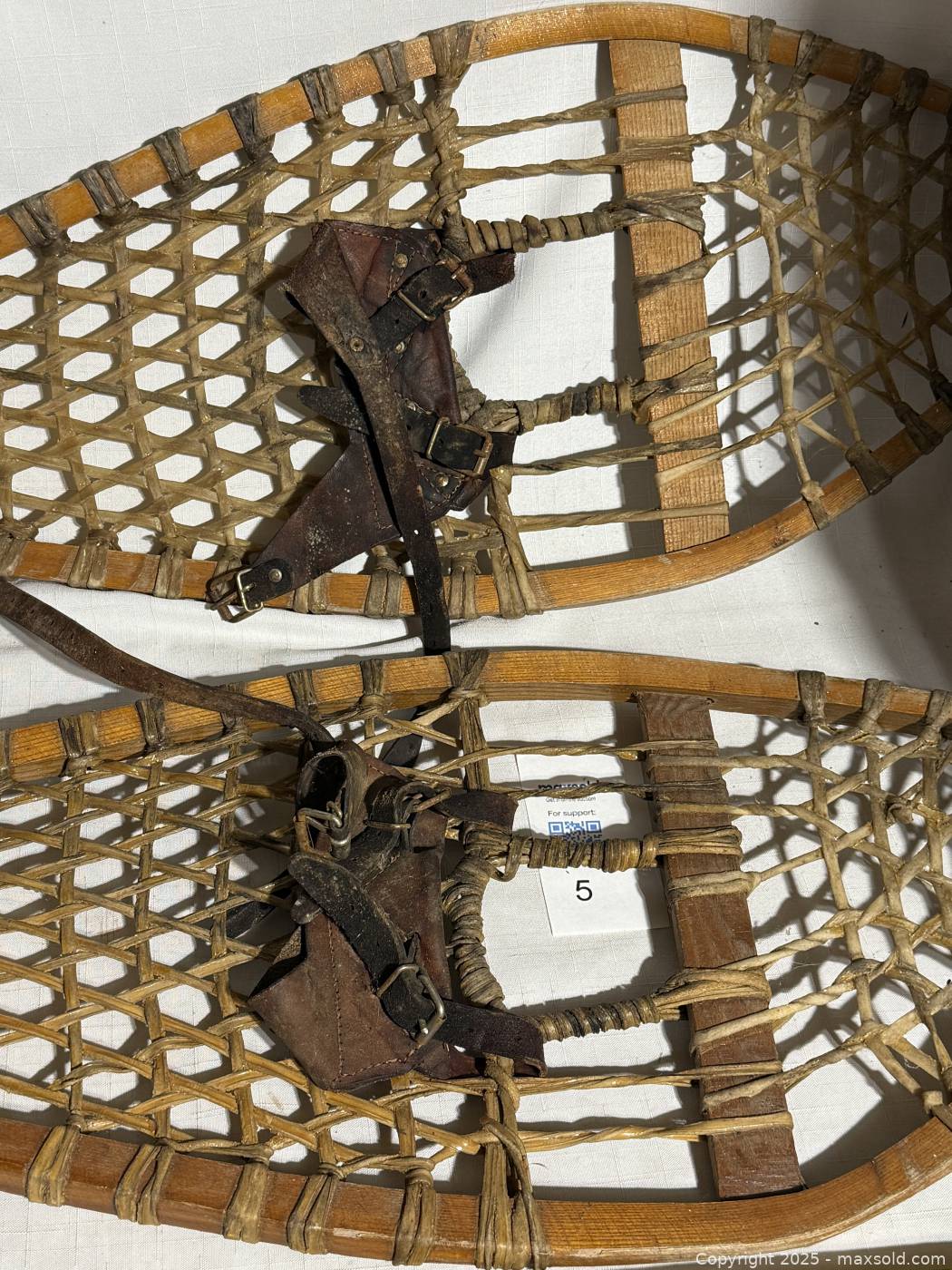 Vintage Huron-style wooden snowshoes pair | Maxsold