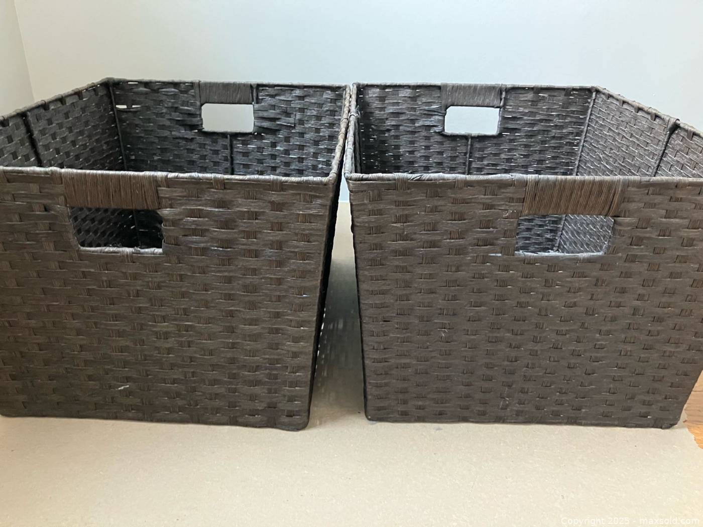 Dark brown wicker storage baskets, pair | Maxsold