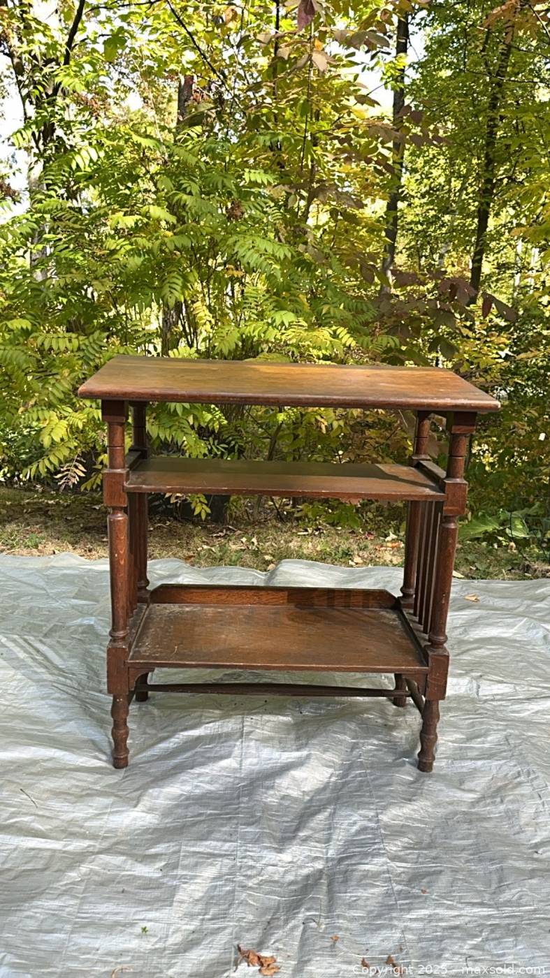 Oak three-tier side table | Maxsold