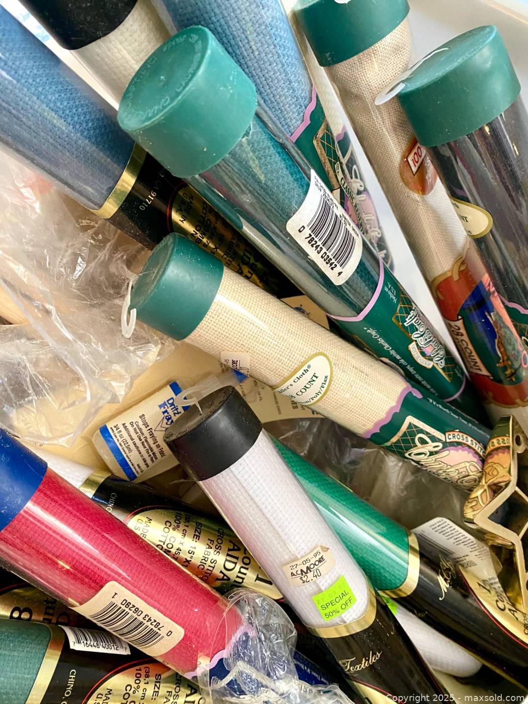 Cross stitch fabric rolls, stretcher bars & thread | Maxsold