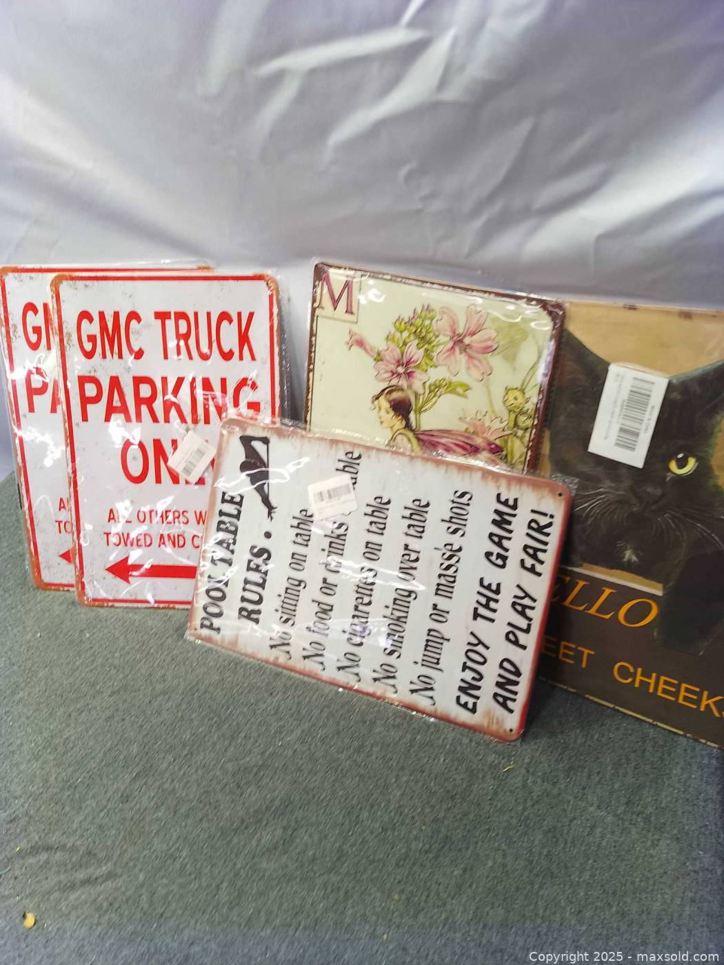 Five novelty tin wall signs | Maxsold
