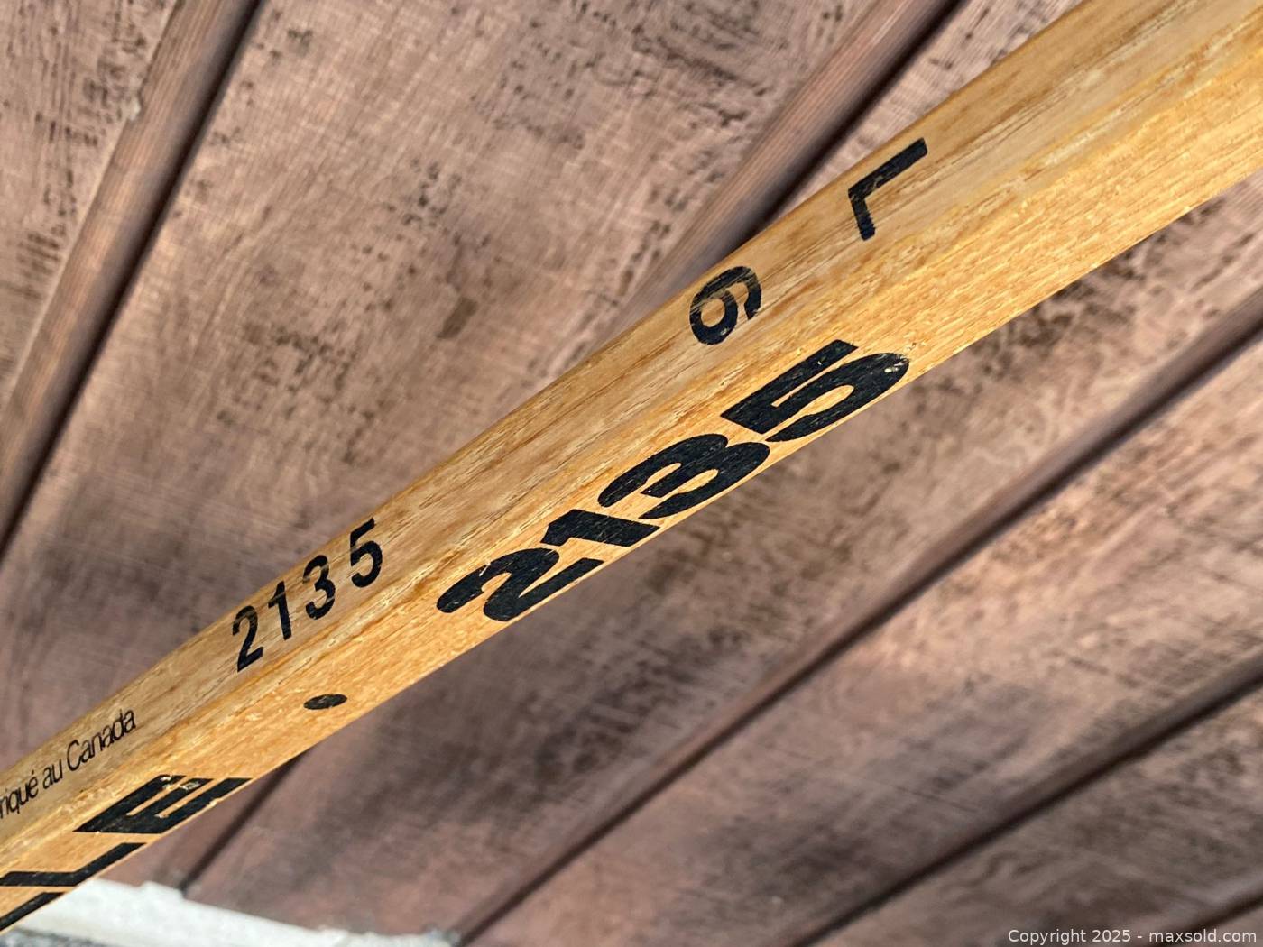 Louisville mini bats & hockey sticks | Maxsold