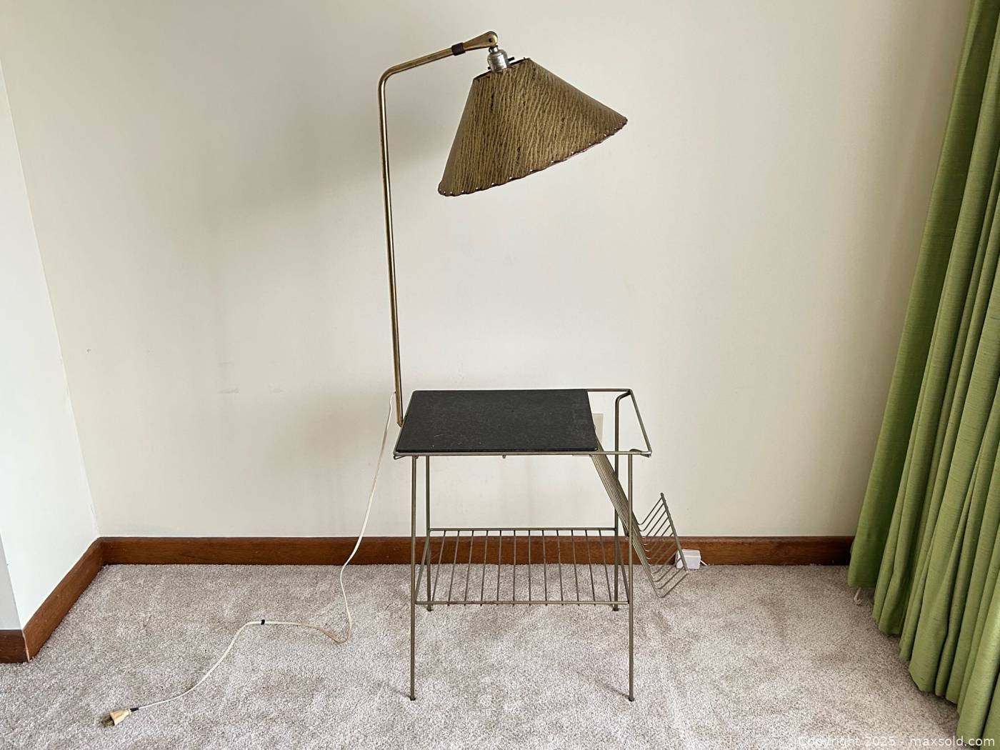 Mid-Century Modern floor lamp with end table and magazine rack | Maxsold