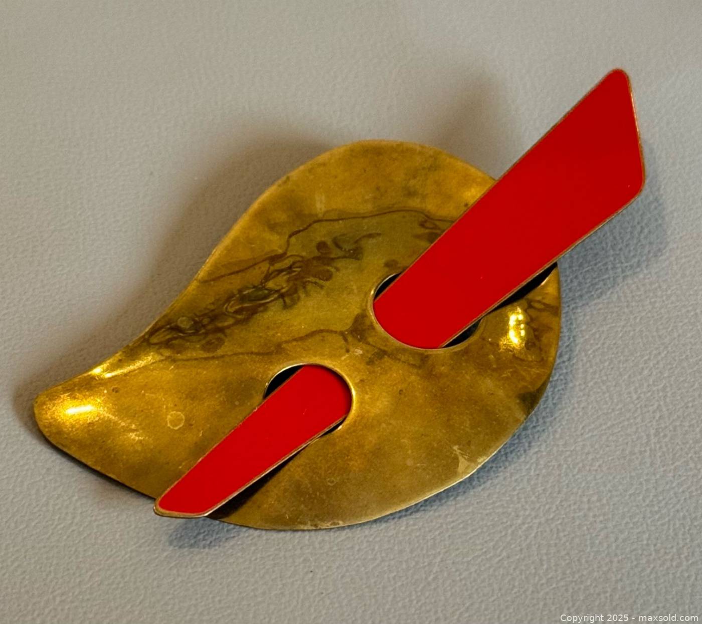 Signed modernist metal brooches, pair | Maxsold