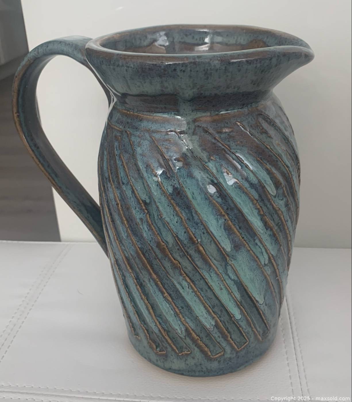 Handmade stoneware pottery pitchers | Maxsold
