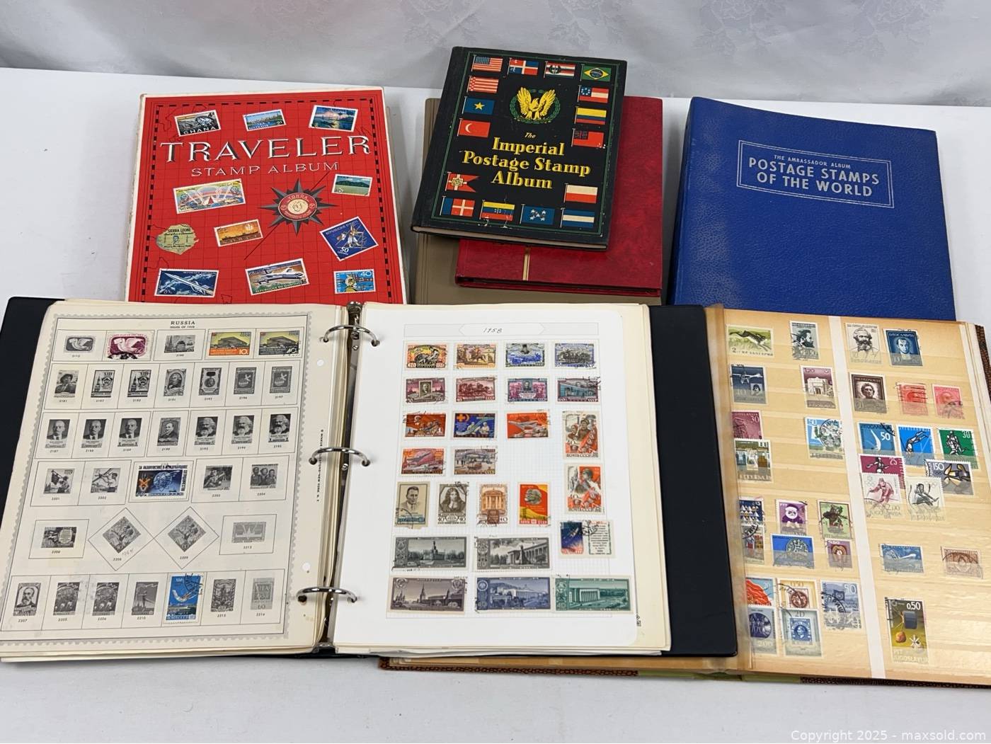 Seven International Stamp Albums With Stamps | Maxsold