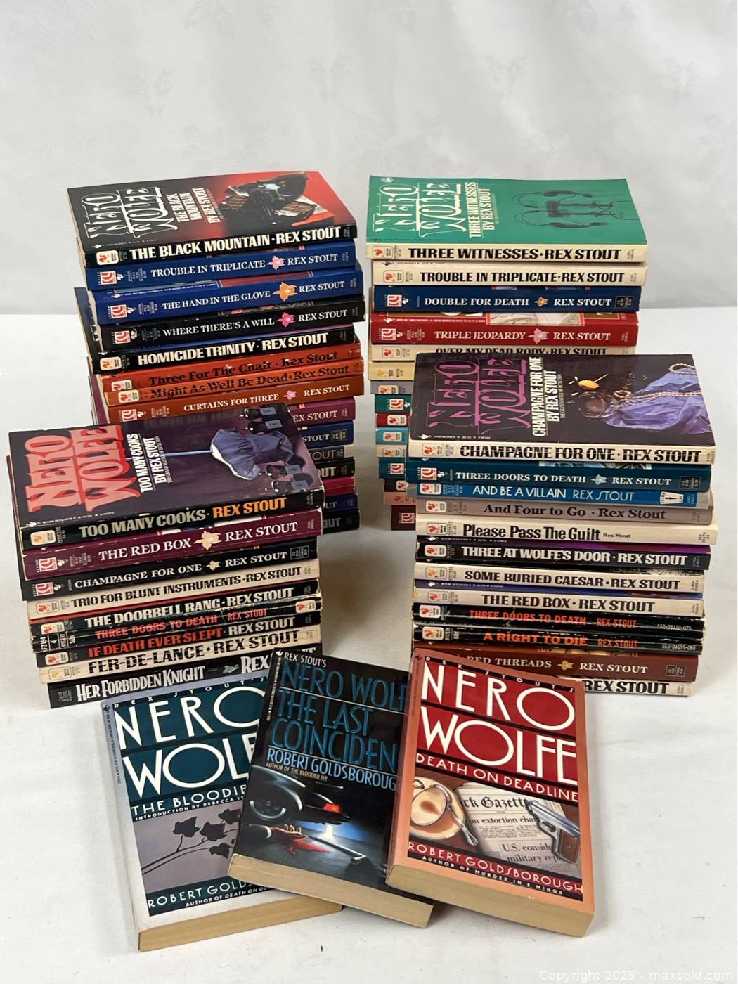 54 Rex Stout “Nero Wolfe” paperbacks | Maxsold