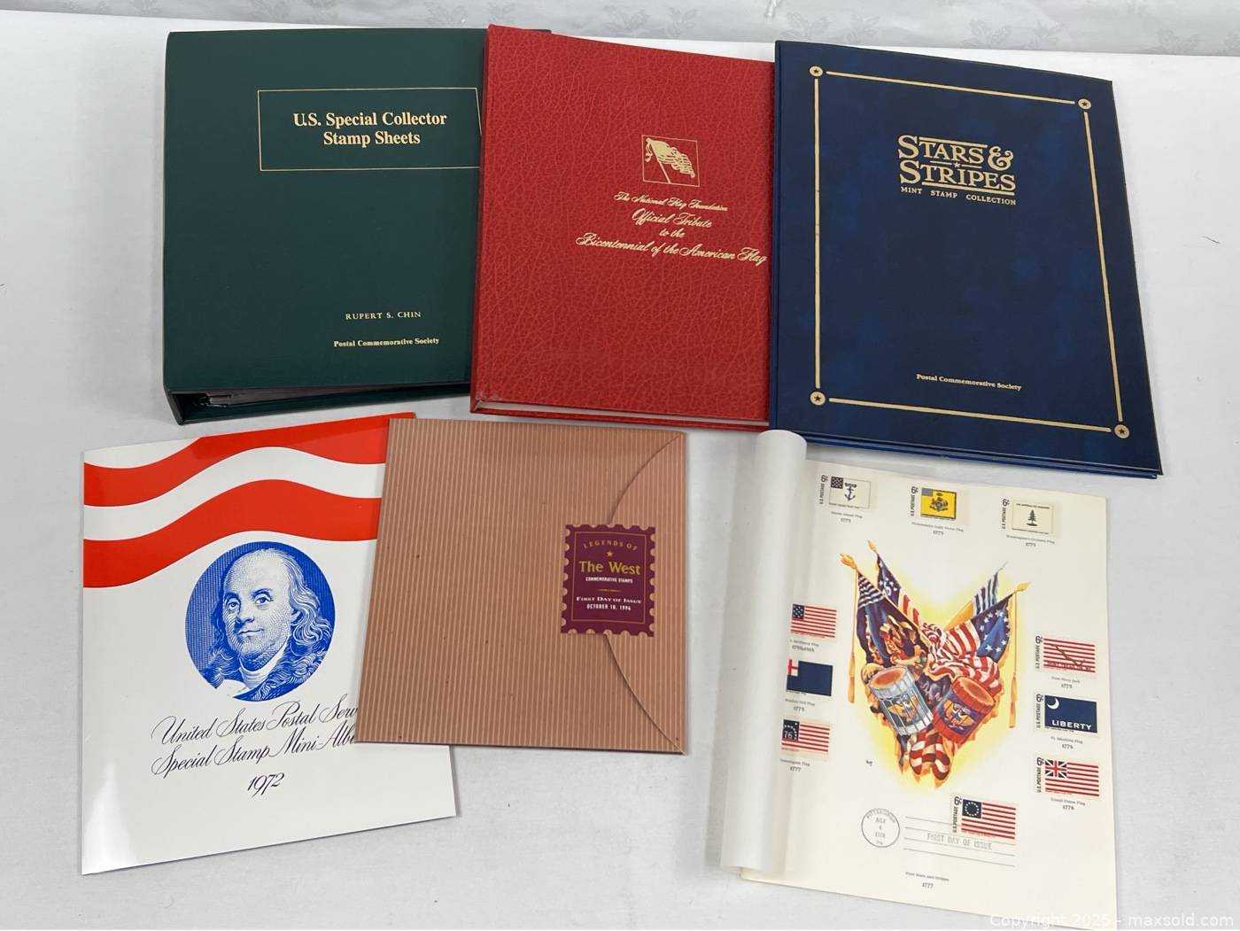U.S. stamp albums, sheets & flag issues | Maxsold