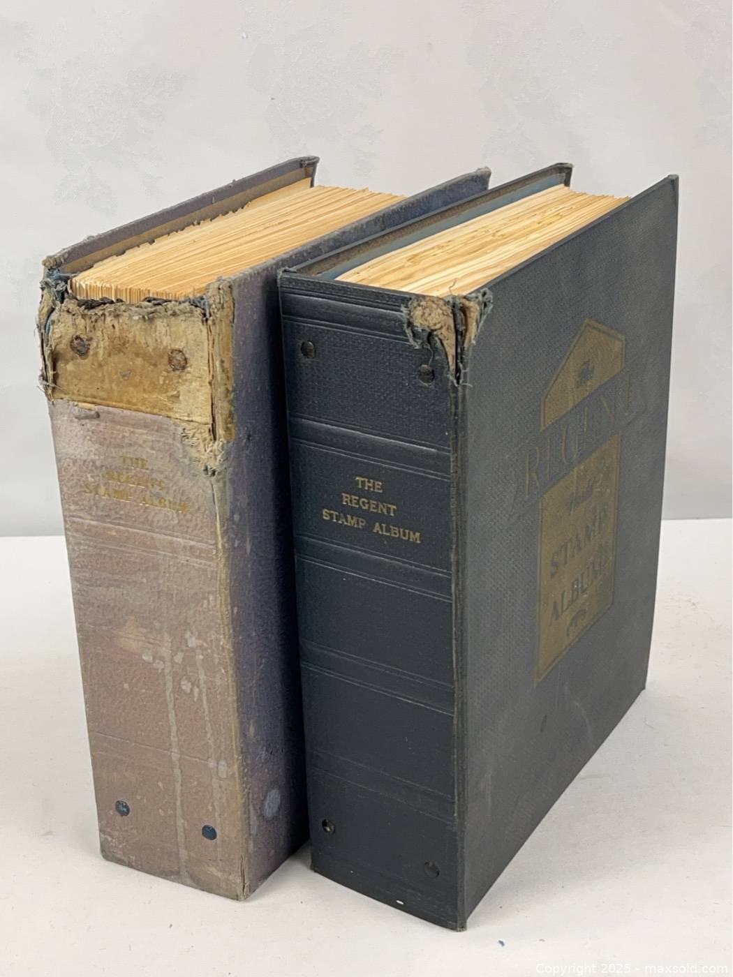 Regent World Stamp Albums | Maxsold