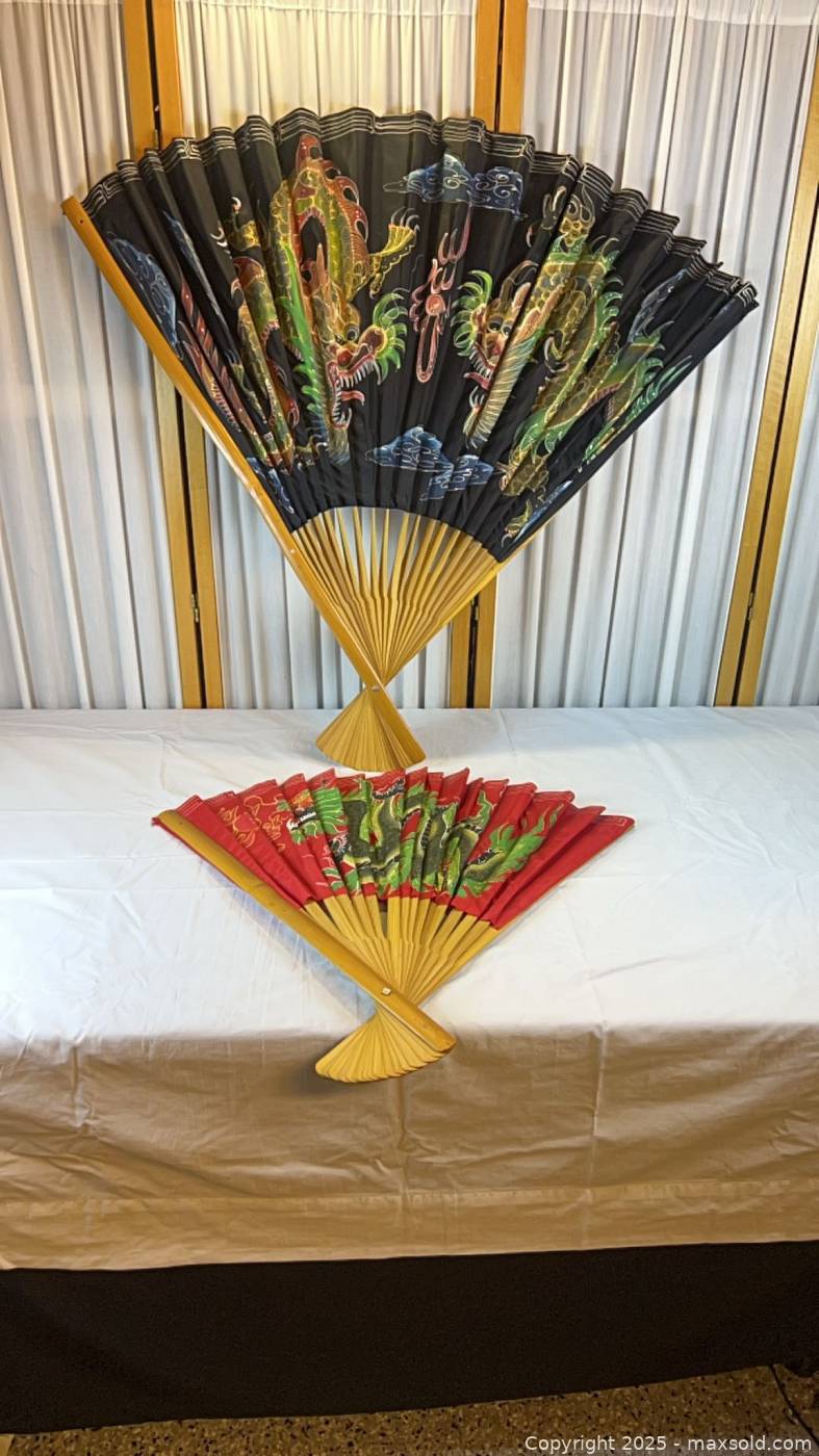 Pair of large dragon motif folding wall fans | Maxsold