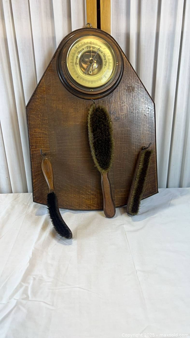 Wall-mounted aneroid barometer and 3 brushes | Maxsold
