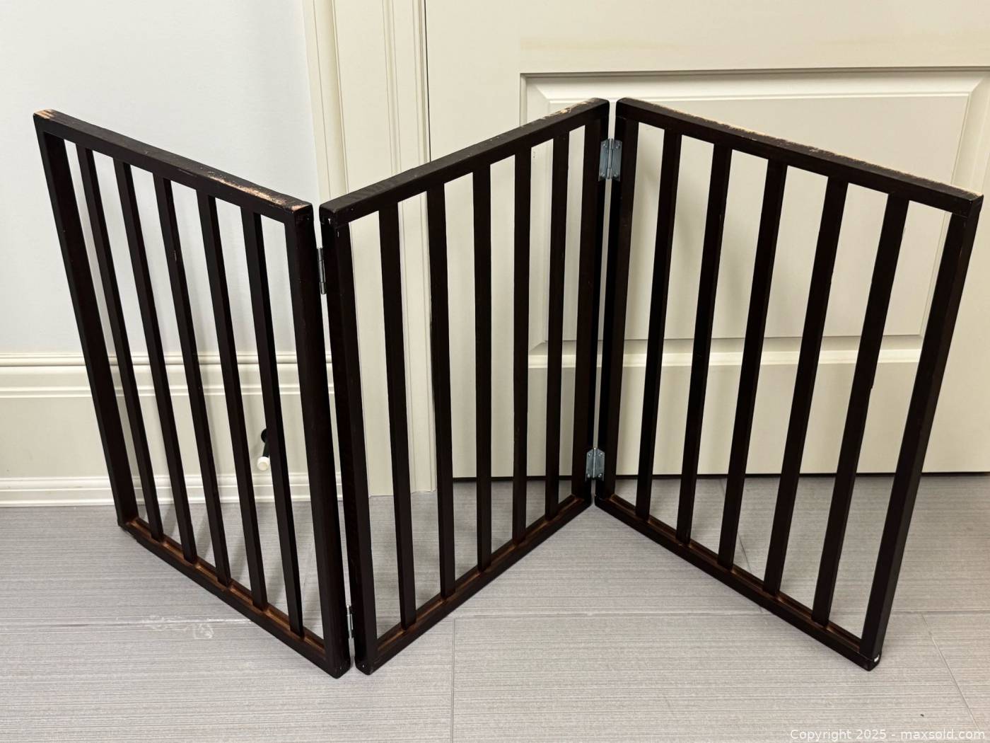 Pair of wooden folding pet gates | Maxsold