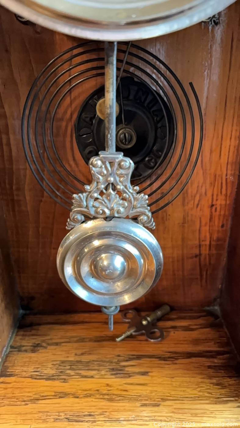 Antique oak mantel clock with key | Maxsold