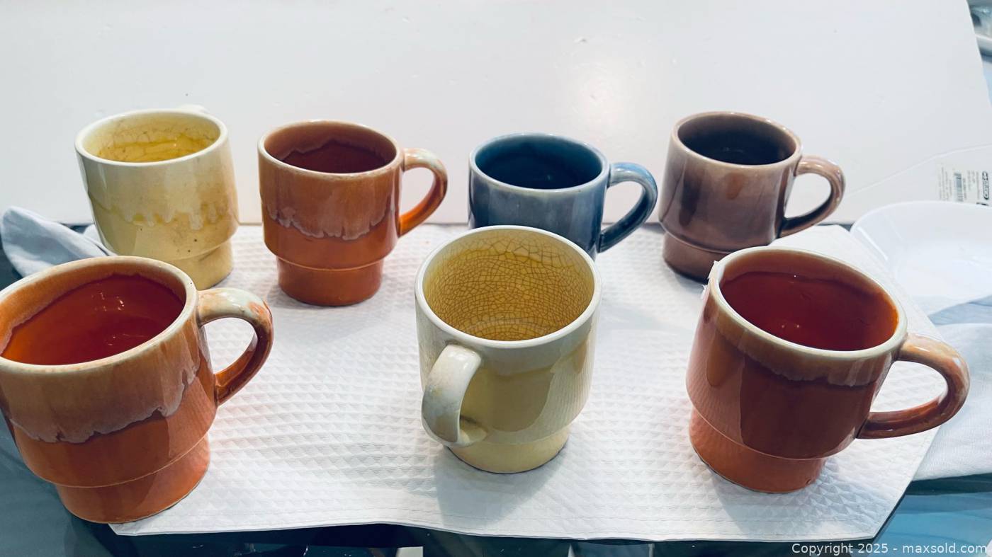 Set of seven retro ceramic nesting mugs | Maxsold